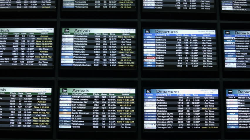 Airport Timetable Arrivals And Departures Board With Changing Flight ...