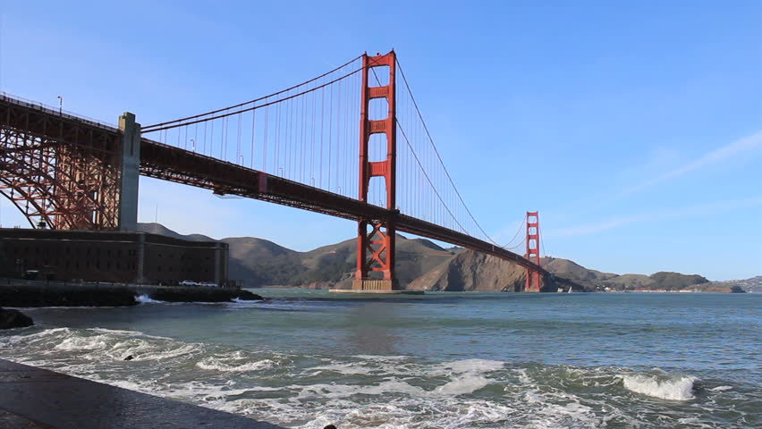 Stock Video Clip of Waves pound the coastline hard under the | Shutterstock