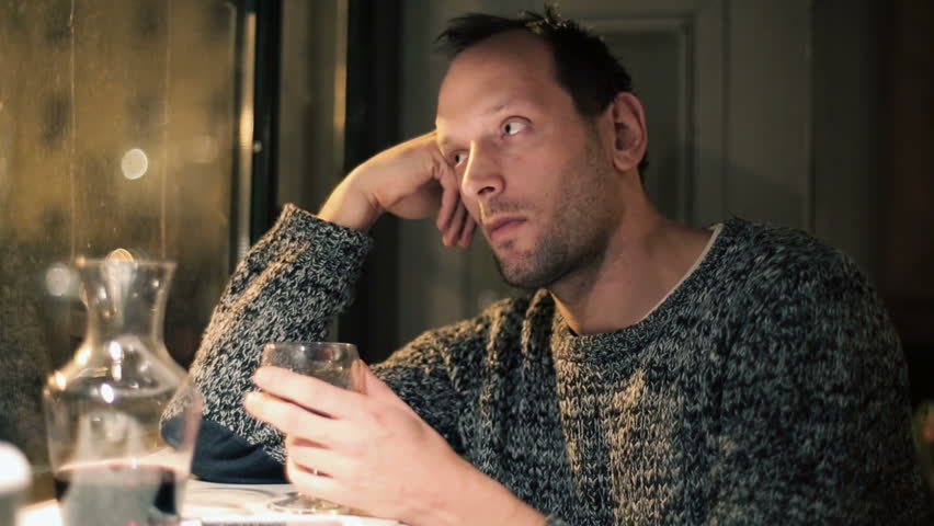 Young Sad, Lonely Man Waiting For Someone In Bar, Night Time Stock ...