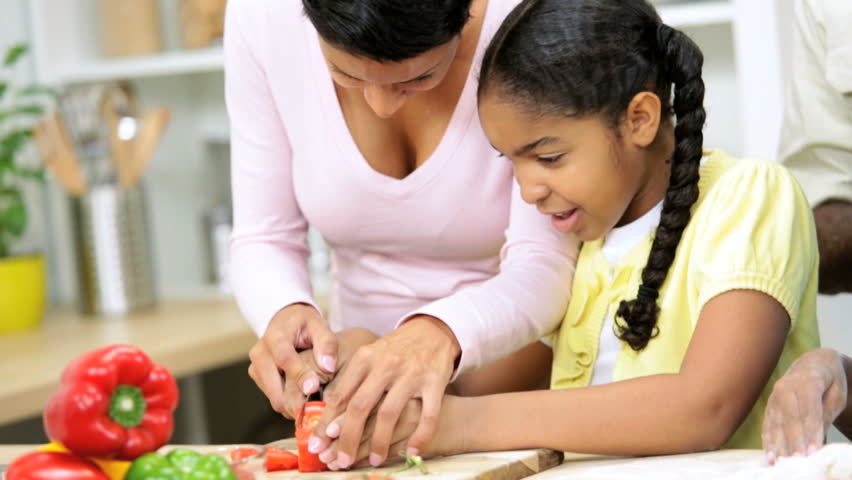 Stock video of little ethnic girl being supervised by | 5974319 ...