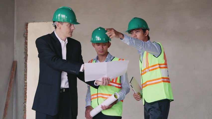 Team At Work And Collaboration In Building Industry. Men Working In ...