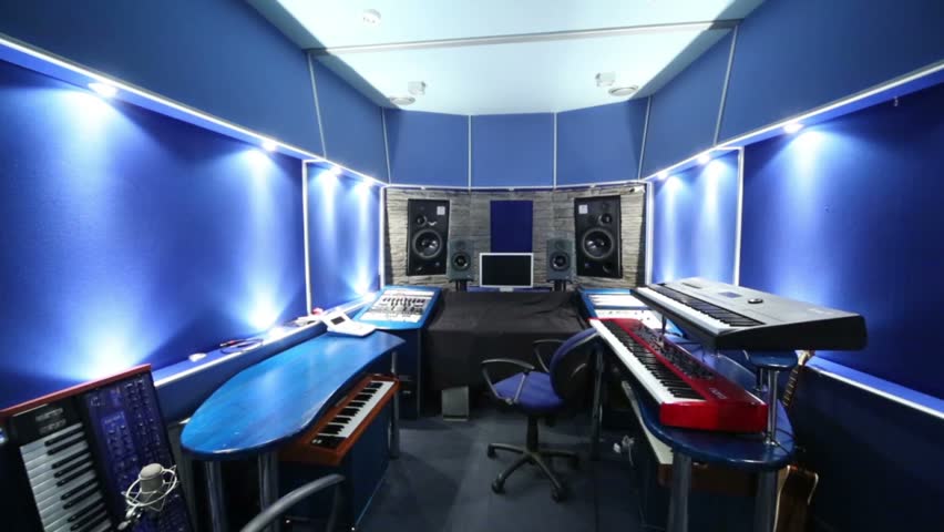 Blue Recording Studio With Equalizer, Speakers And Keyboards ...