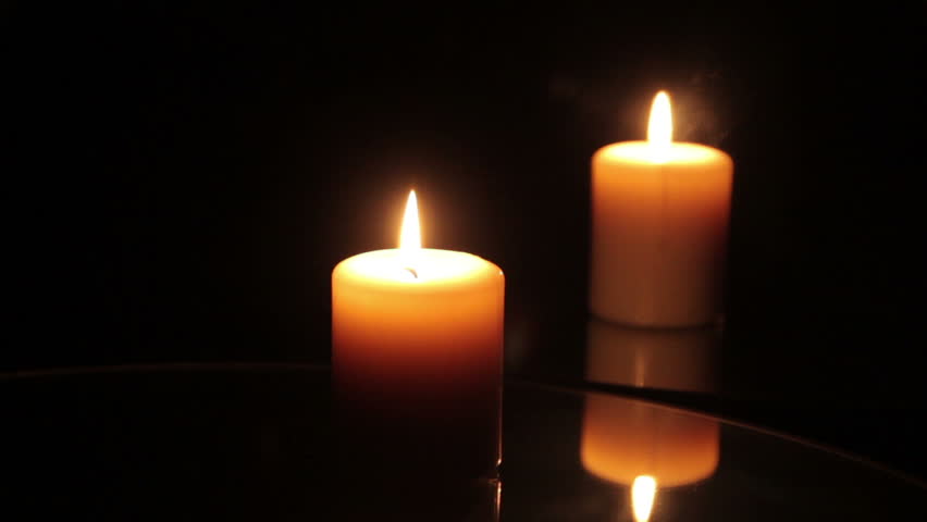 This Is A Seamless Loop Of 3 Warm Candles Gently Burning In A Black ...
