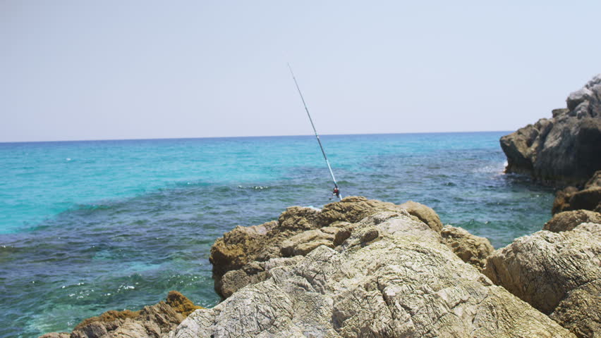 Fishing Rod On a Rocky Stock Footage Video (100% Royalty-free) 7606219 ...
