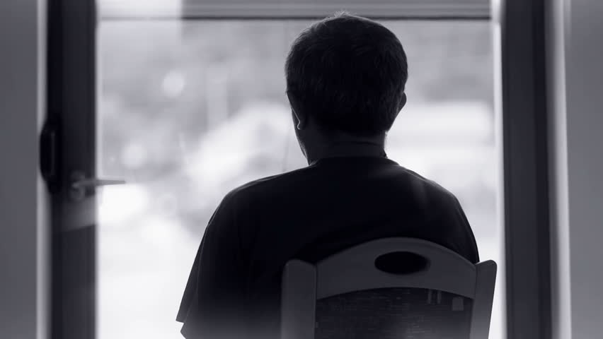 Depressed Person Watching Through Windows. Person Portrait From Back ...
