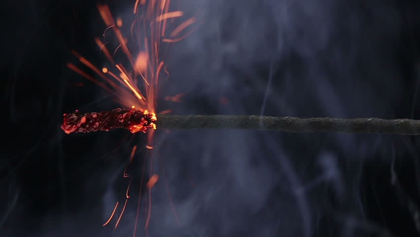 Stock video of fuse is ignited by smoldering torch. | 9426539 ...