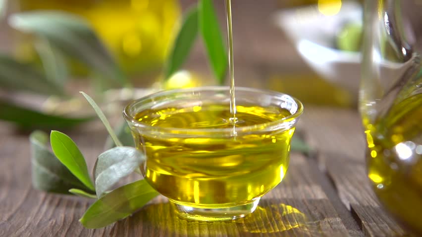 Olives And Pouring Olive Oil. Extra Virgin Olive Oil Pouring From The ...