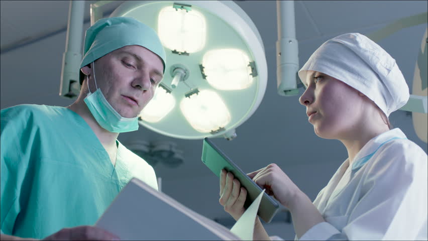 Surgeon is Reading a Patients Stock Footage Video (100% Royalty-free ...