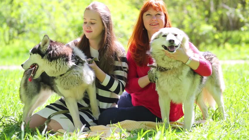 Stock video of daughter and mother along with two | 9849569 | Shutterstock