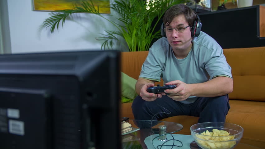 Stock video of victory of a tense game. young | 9881669 | Shutterstock