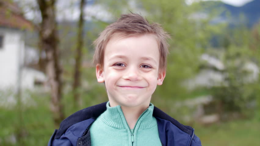 Slow Motion Of Kid Smiling In Camera Stock Footage Video 9887252 ...