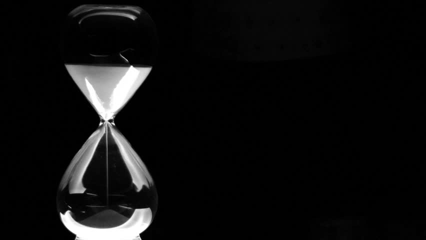 Isolated Hourglass. Hourglass With White Sand. Black Stock Footage ...